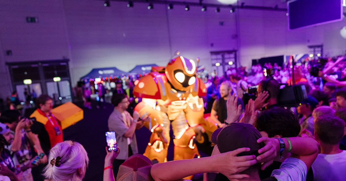 DHL Unveils “CARGO” Robot Mascot at Snapdragon Pro… | MobileMatters