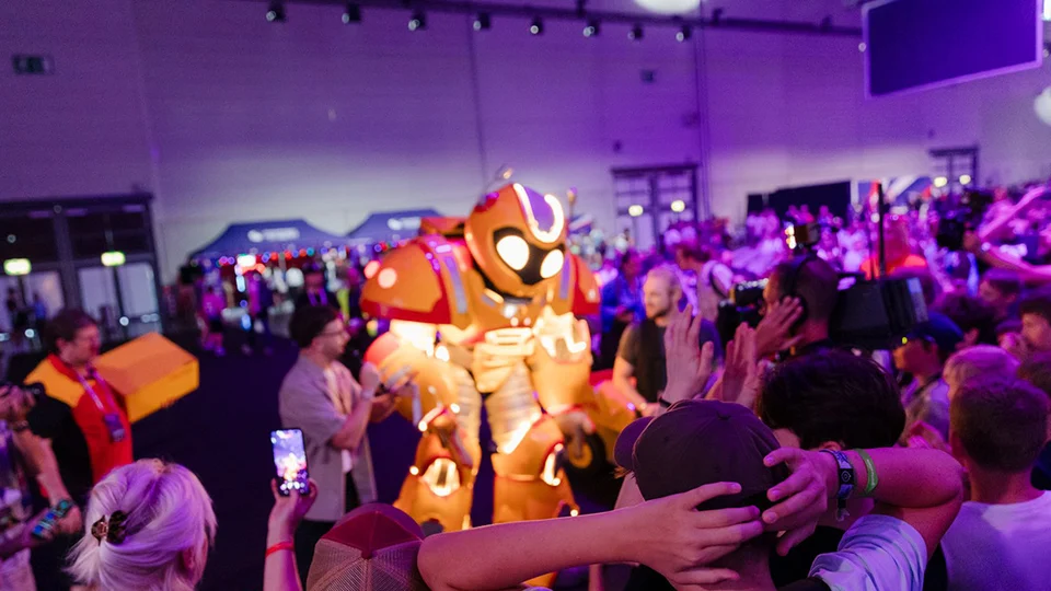 DHL Unveils “CARGO” Robot Mascot at Snapdragon Pro… | MobileMatters